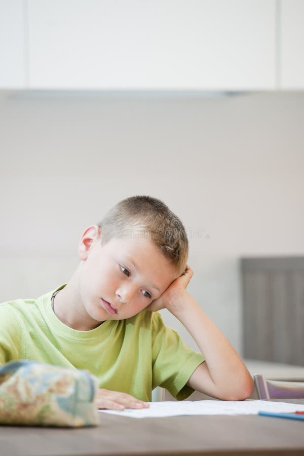Tired/exhausted Little Boy with His Homework Stock Image - Image of ...