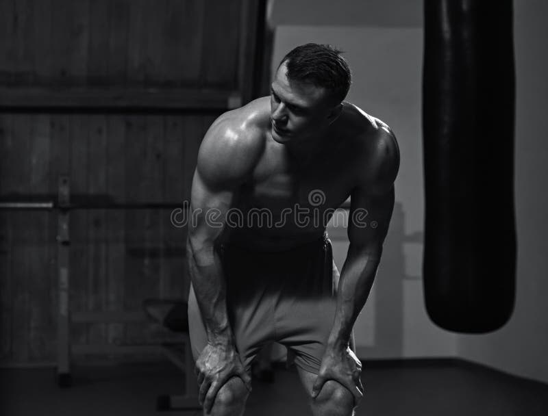 Tired athlete resting stock photo. Image of bodybuilder - 117457938