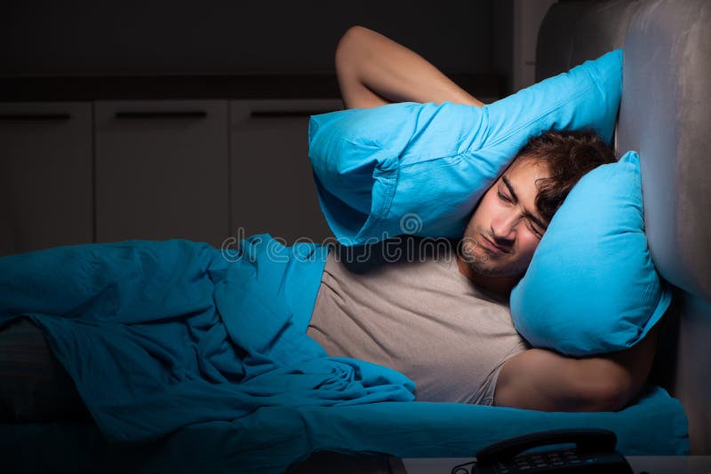 The Tired Exhausted Man Sleeping in His Bed Stock Image - Image of ...