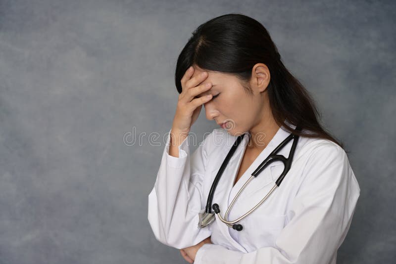 Tired female doctor stock image. Image of fatigue, asian - 113026363