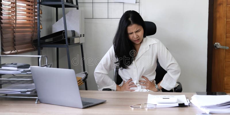 Tired Female Employee Holding Head on Hand, Looking at Computer Screen ...