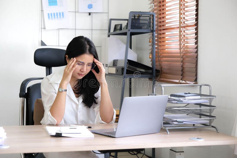 Tired Female Employee Holding Head on Hand, Looking at Computer Screen ...