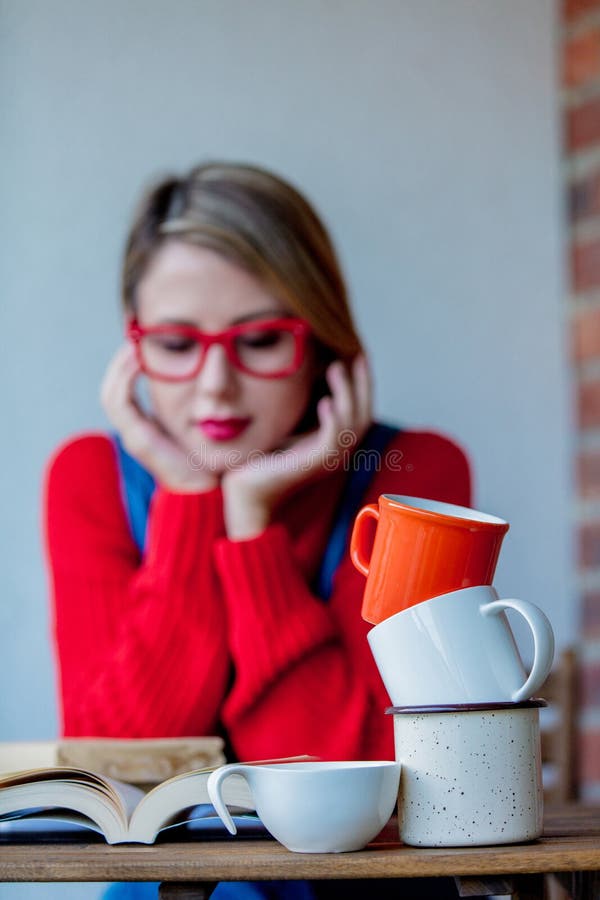 Tired Girl with Cup of Coffee and Books Stock Photo - Image of beauty ...