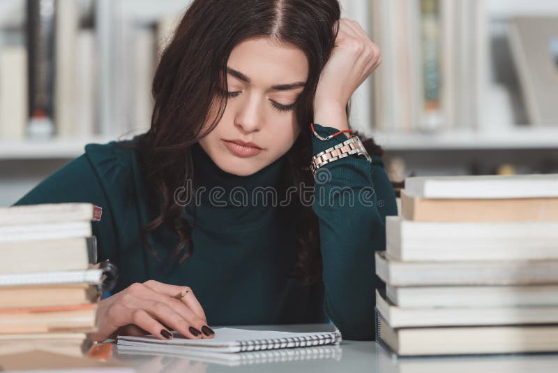 Tired Girl Studying with Notebook Stock Photo - Image of education ...