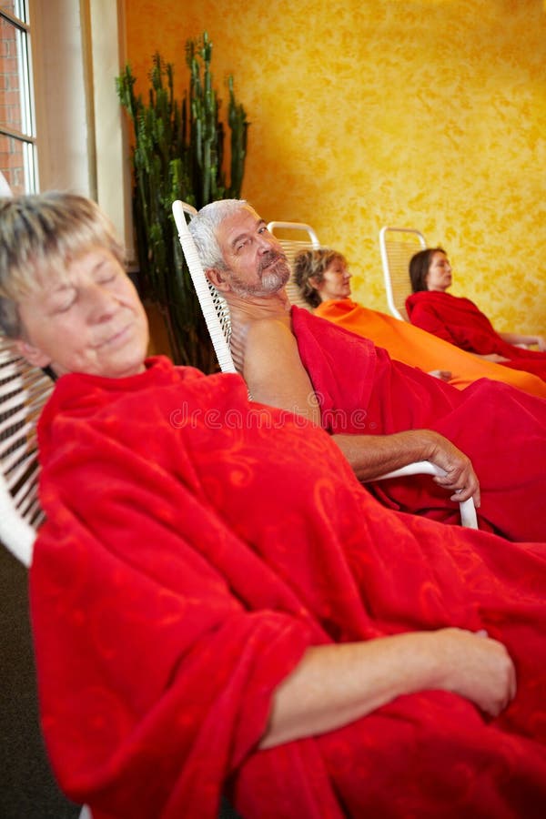 Tired group resting stock photo. Image of sauna, couch - 17232552