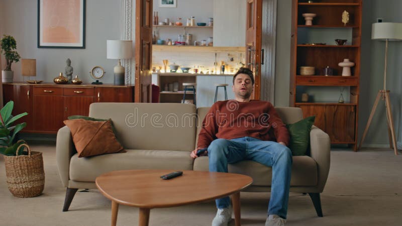 Tired Guy Sit Down Comfortable Couch Home. Exhausted Man Looking on ...