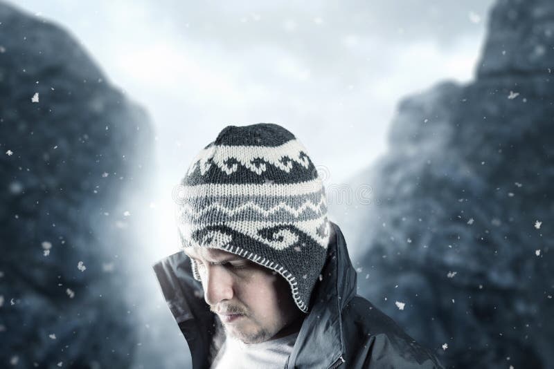 Tired Hiker Looking Down in Front of Blurred Mountain Landscape Stock ...
