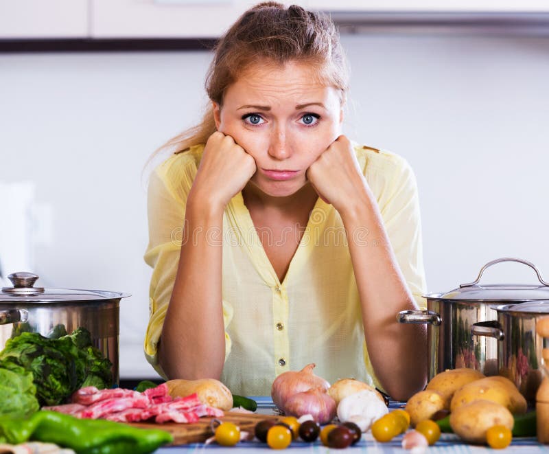Tired housewife at kitchen stock image. Image of clothing - 66016029