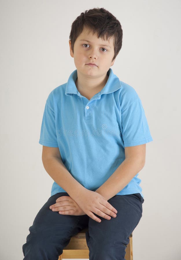 Tired kid stock photo. Image of scarf, dress, chair, studio - 28856580