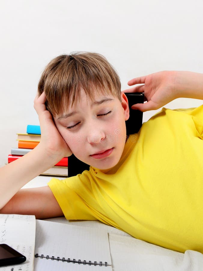 Tired Kid with a Books stock image. Image of problem - 84599941