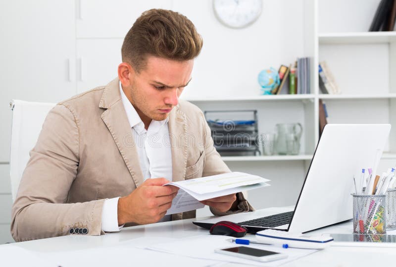 Frustrated Manager Doing Paperwork At Office. Stock Photo - Image of ...