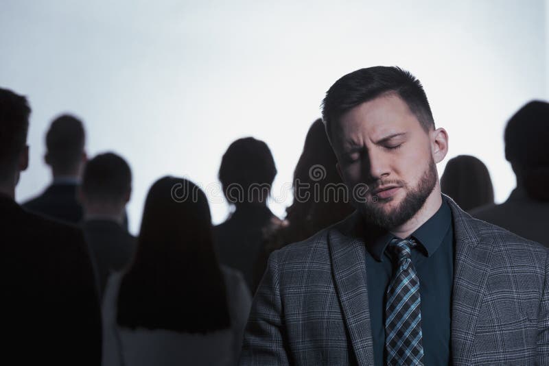 Tired man against a crowd stock image. Image of handsome - 91318165