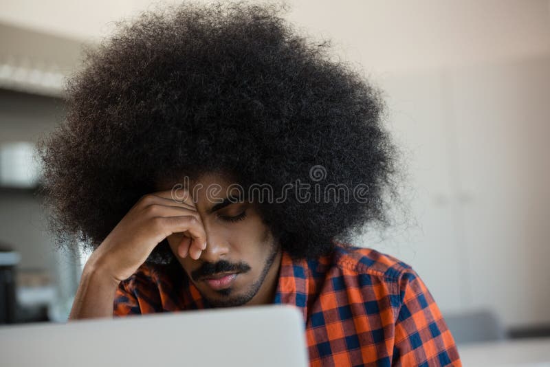 Tired Man with Curly Hair at Office Stock Image - Image of male ...