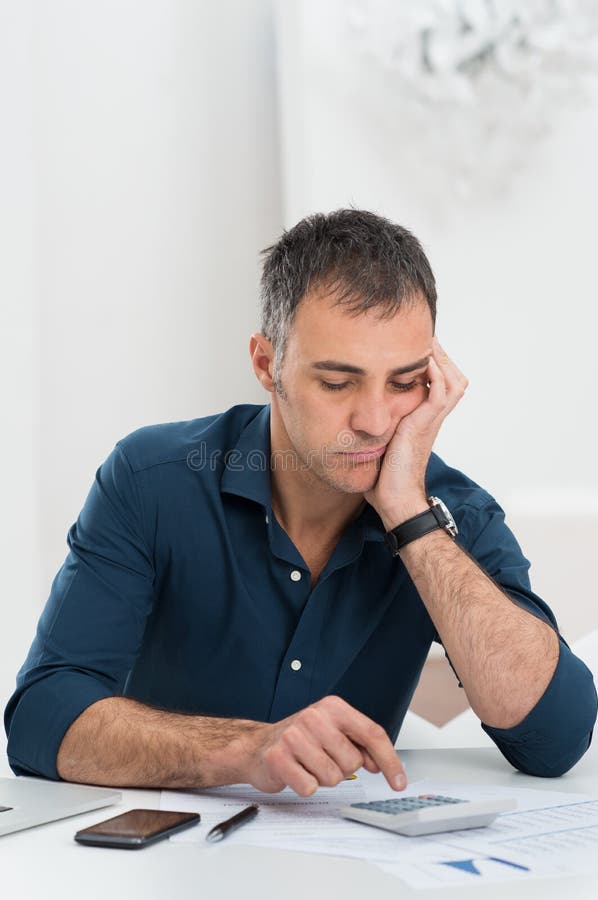 Tired Man Doing Calculations Stock Photo - Image of paperwork, bill ...