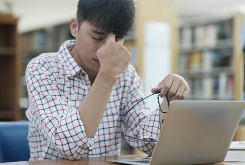 Tired Man Feeling Exhausted from Work in Library Stock Image - Image of ...
