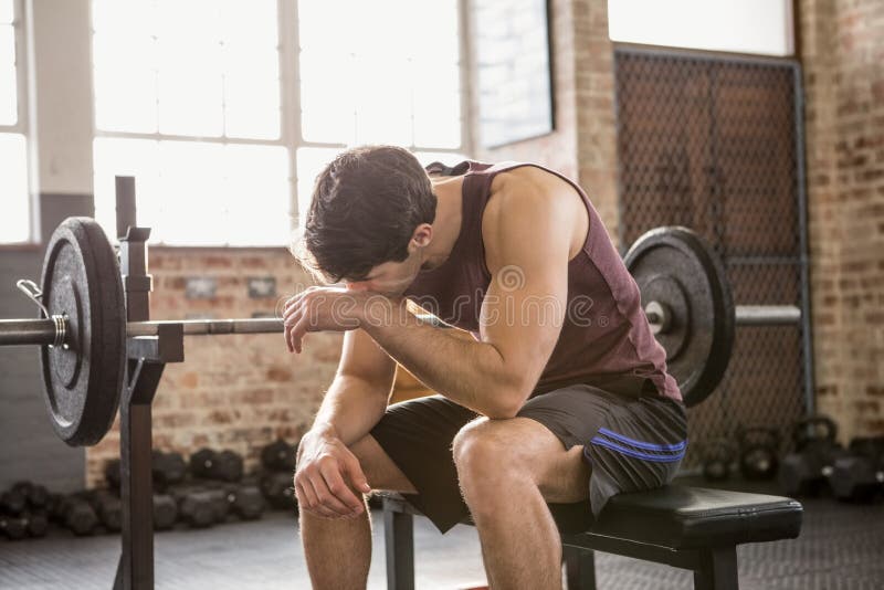 Tired Man Sitting on the Bench Stock Photo - Image of heavy, person ...