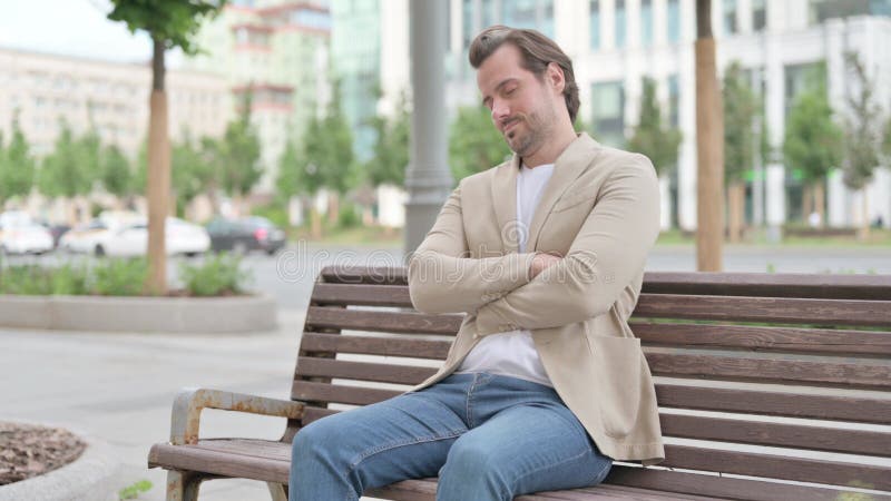Tired Young Man Sleeping while Sitting on Bench Stock Photo - Image of ...