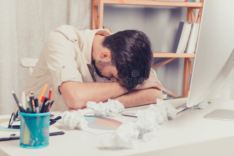 Tired Man Sleeping on Work, Crumpled Paper on the Table Stock Image ...