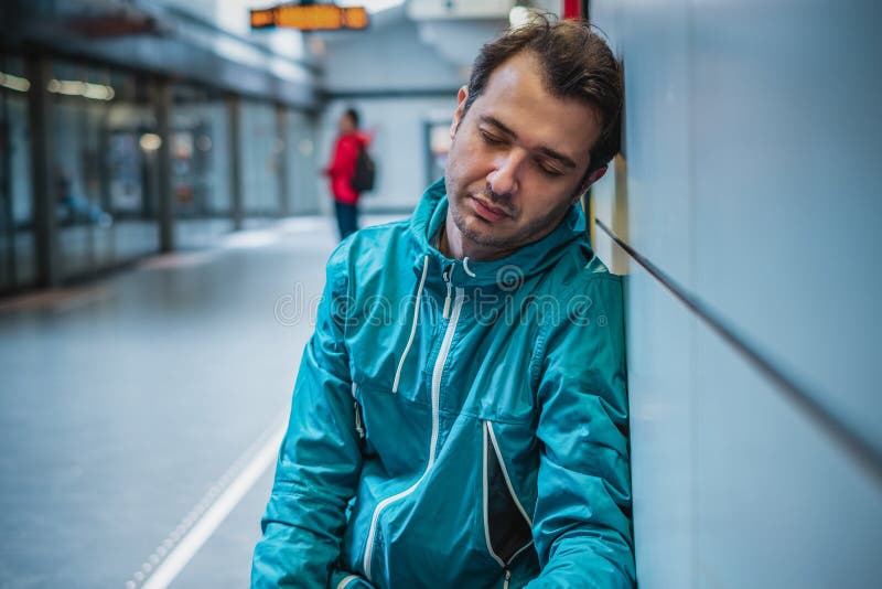 Tired Man Sleeps in the Metro Train Station Stock Image - Image of ... Tired Man Sleeps in the Metro Train Station Stock Image - Image of ...