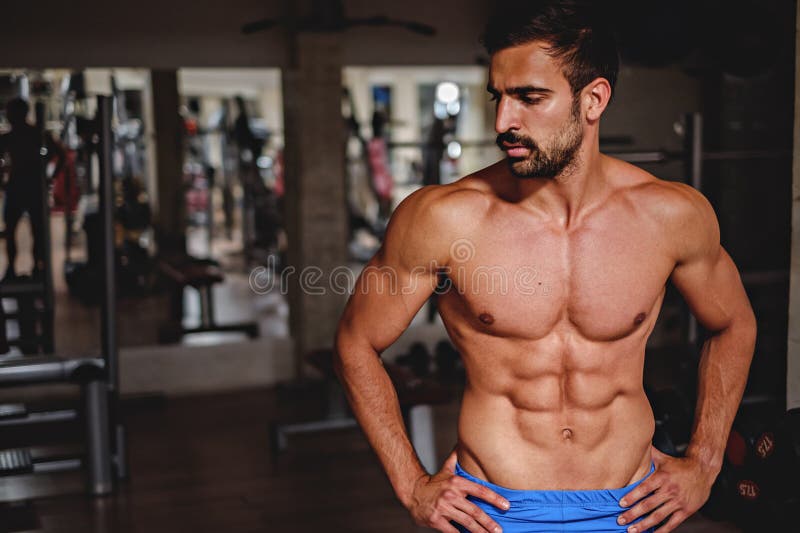 Tired Man Standing in the Gym and Looking To the Side Stock Image ...