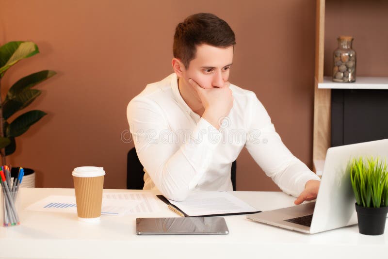 Tired Man Working at the Computer in the Office. Stock Photo - Image of ...