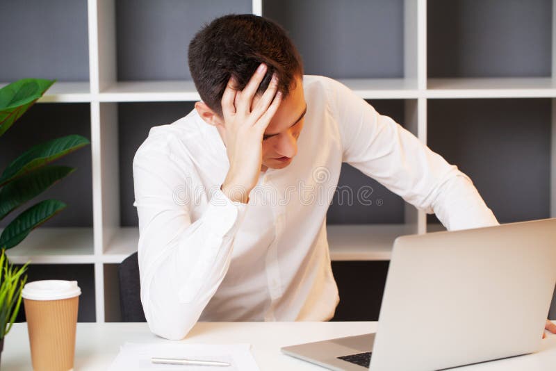 Tired Man Working at the Computer in the Office Stock Photo - Image of ...