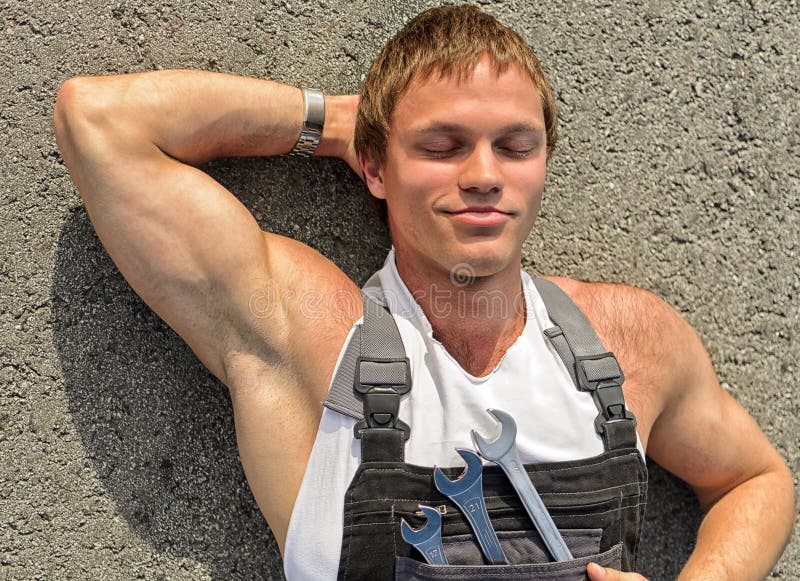 Tired mechanic resting stock image. Image of equipment - 25406439