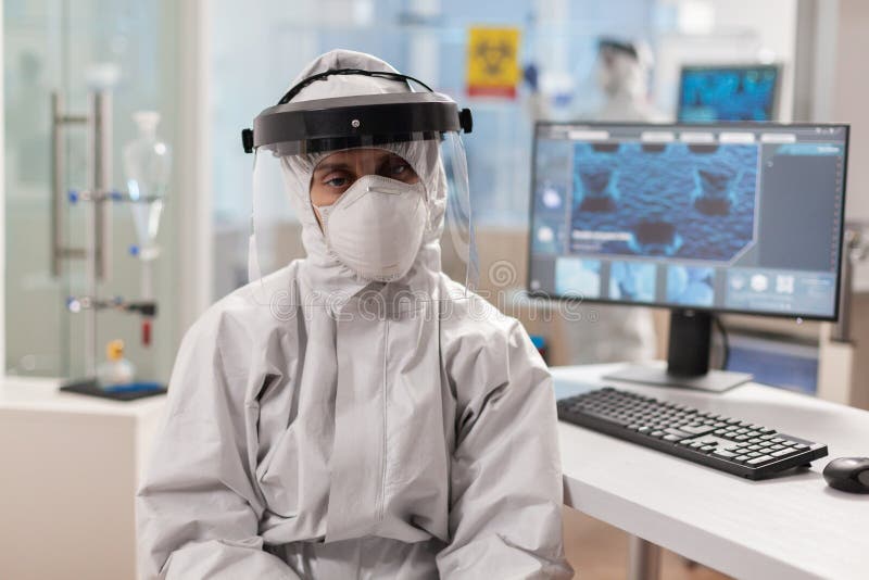 Tired Microbiologist in Coverall Sitting in Laboratory Stock Image ...