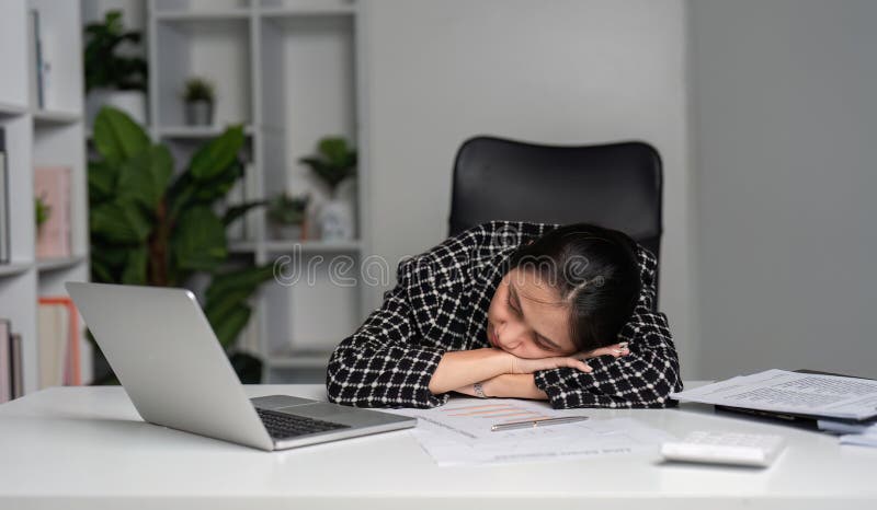 Exhausted Office Worker Sleeping at Desk with Laptop and Documents in ...