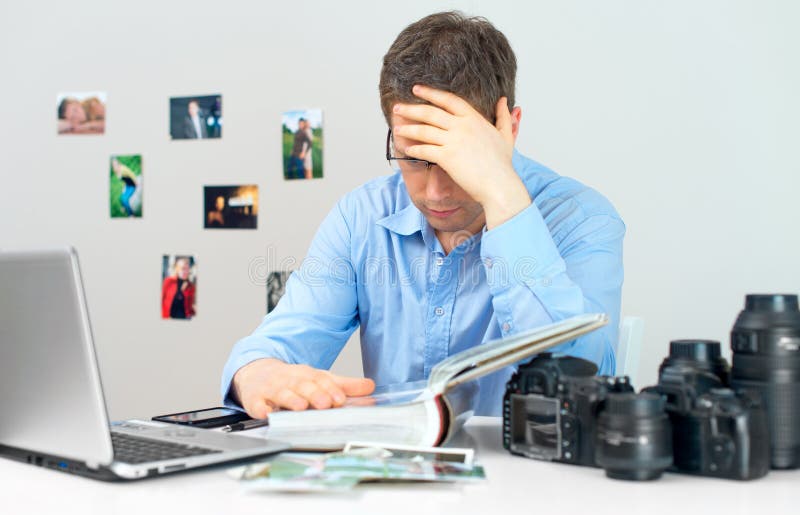 Tired photographer. stock image. Image of choosing, male - 54140999