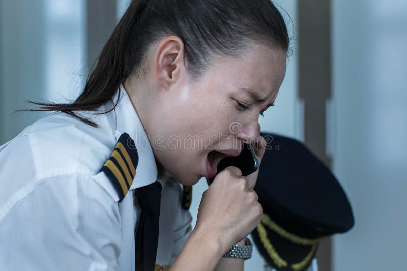 Tired Pilot Yawning at Work Stock Photo - Image of lethargic, people ...