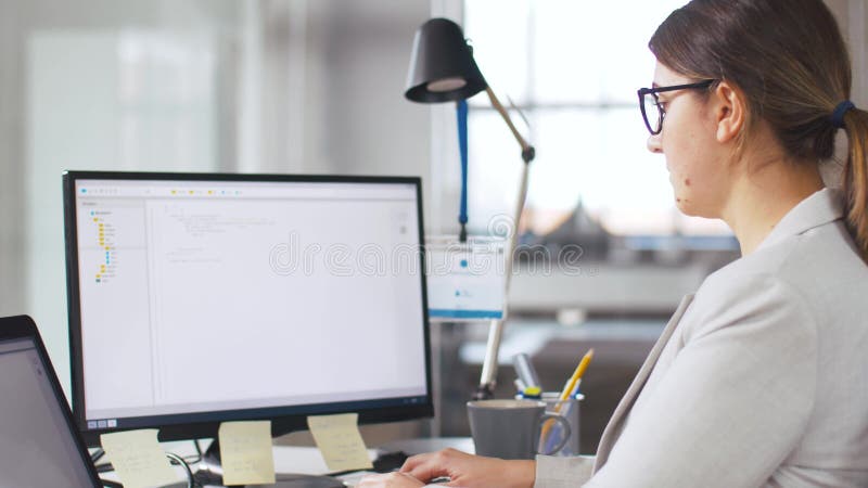 Tired Programmer Monkey Working Intensely on Laptop, Coding Late with Stressed Facial Expression ...