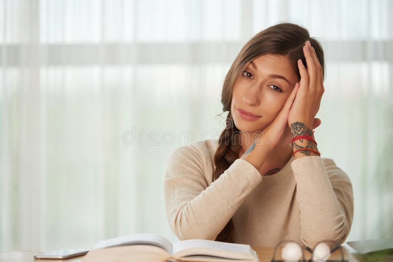 Tired of reading stock image. Image of attractive, look - 94003371