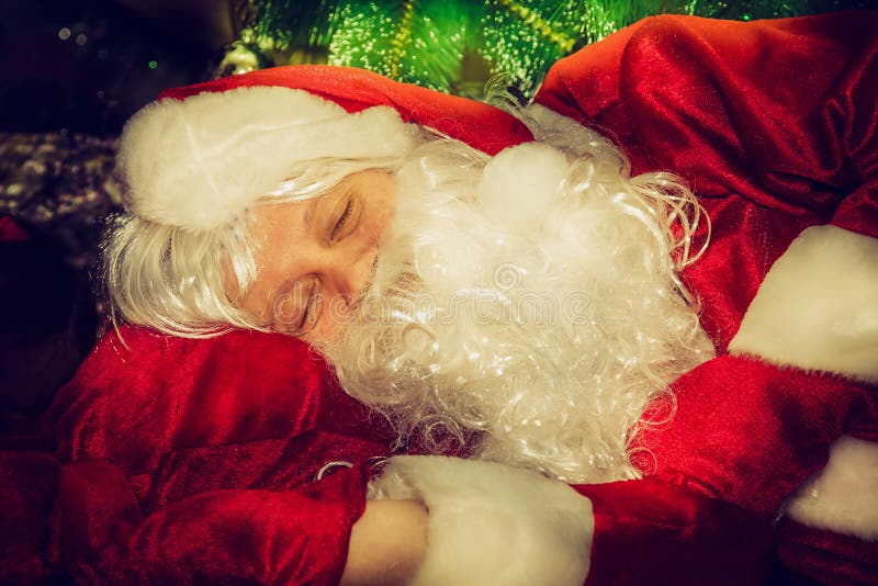 Tired Santa Claus Sleeping Under the Christmas Tree. Stock Image ...