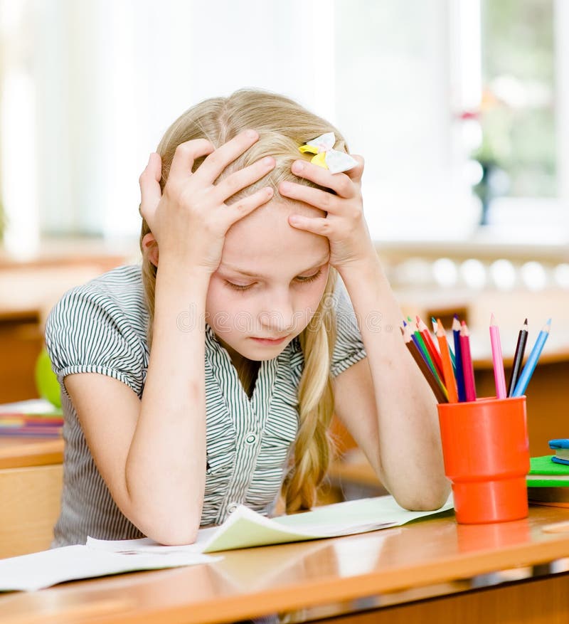Tired Schoolgirl in Classroom Stock Photo - Image of caucasian, indoor ...