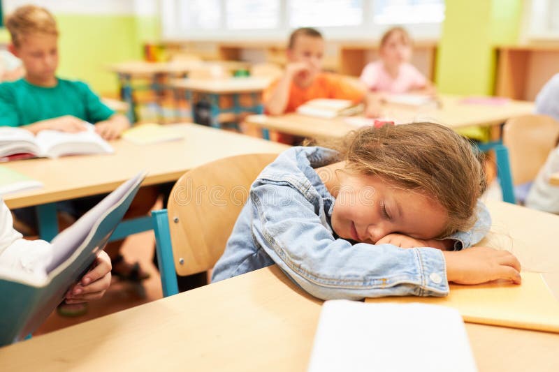 Tired Schoolgirl Sleeping on Bench in Class Stock Photo - Image of ...