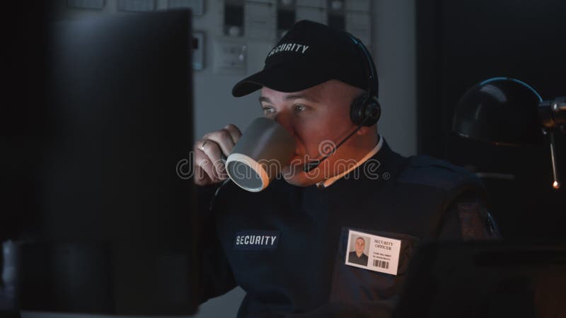 Tired Security Officer Drinks Cup of Coffee Stock Photo - Image of ...