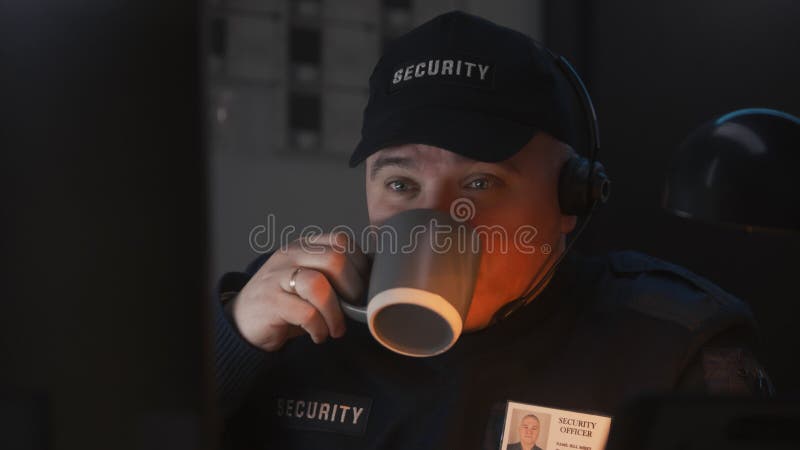 Tired Security Officer Drinks Cup of Coffee Stock Photo - Image of ...