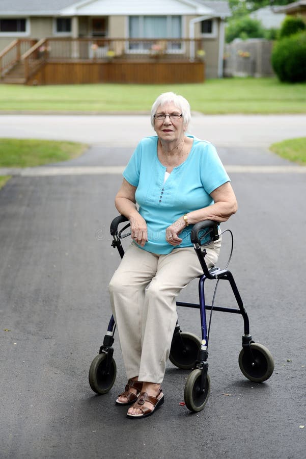 Elderly woman with walker stock photo. Image of aged, lane - 8962694