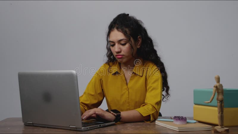Tired South Asian Woman Working on Her Laptop with a Tense, Upset ...