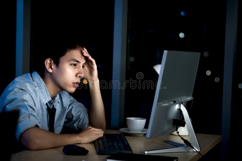 Tired Staff Officer Put Head on Hands during Work with Desktop Computer ...