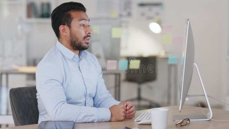 Tired, Stressed and Frustrated Man Typing on a Computer and Looking ...
