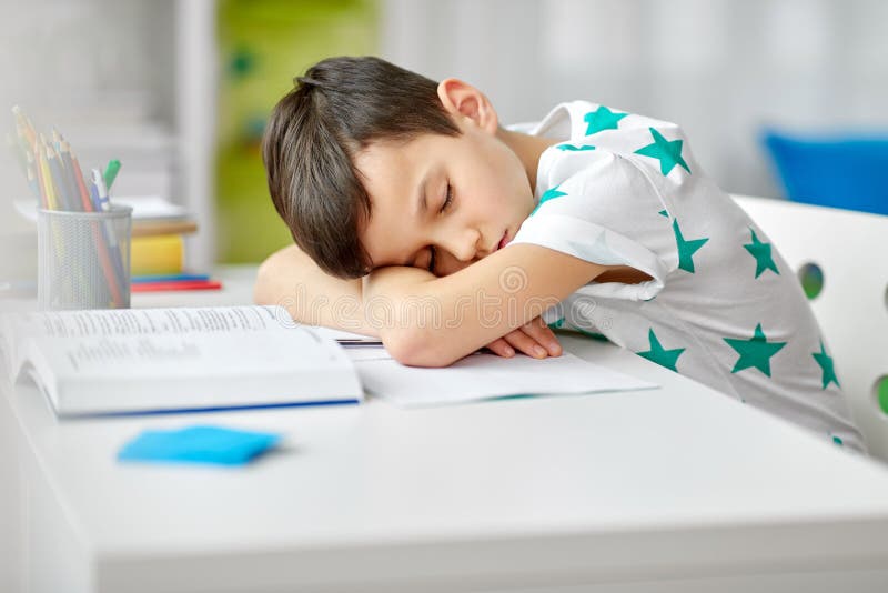 Tired Student Boy Sleeping on Table at Home Stock Photo - Image of ...