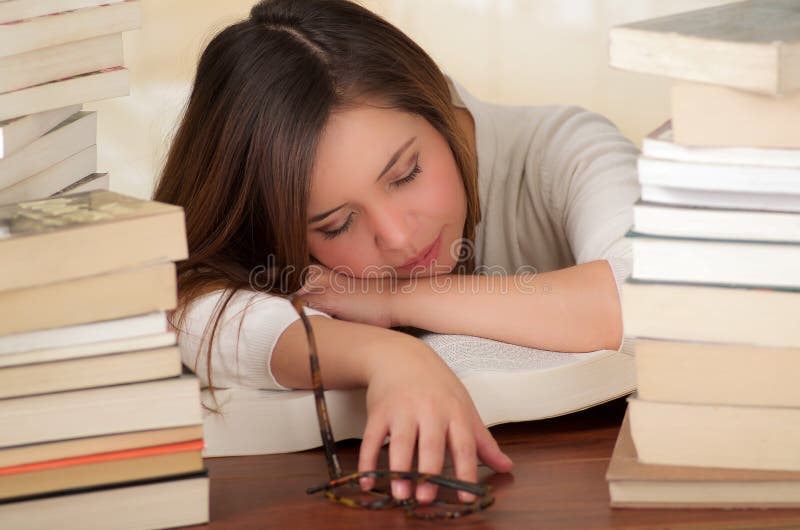 Tired Student Completely Sleep Over the Books in the Library Stock ...