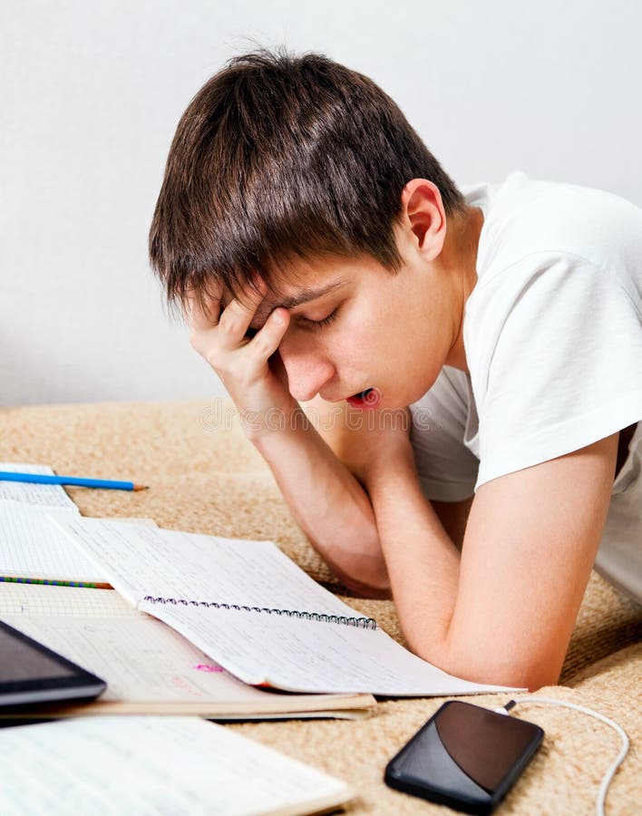 Tired Student Doing Homework Stock Image - Image of lassitude, homework ...
