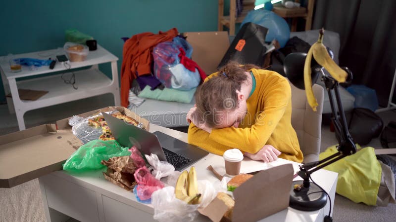 Tired Student Sleeping on Table in Home in Messy Room. Young Overworked ...