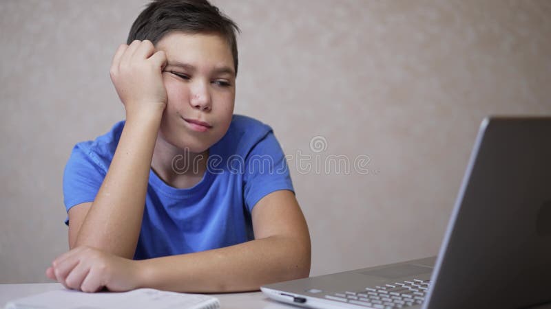 Tired boy in online lesson stock video. Video of quarantine - 278104951