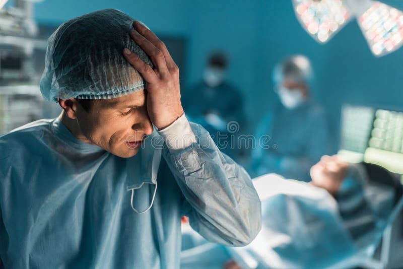 Tired Surgeon Touching Head Stock Image - Image of male, room: 119817611