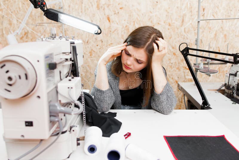 Tired Tailor at Her Workplace with Headache Stock Image - Image of ... Tired Tailor at Her Workplace with Headache Stock Image - Image of ...