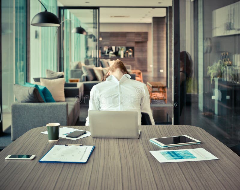 Tired Western Businessman with a Lot of Work in Office Stock Image ...